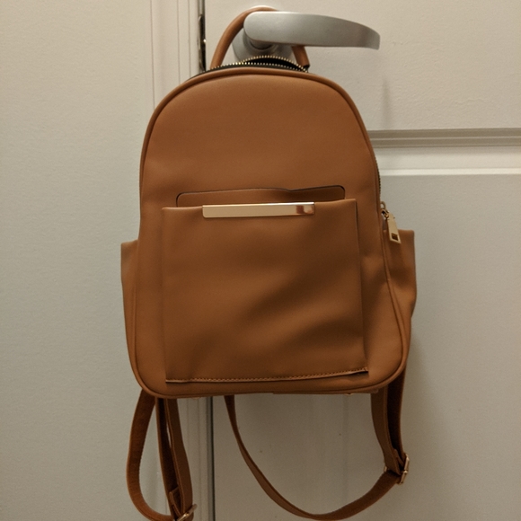 Bags | Four Pocket Tan Minibackpack Used Once | Poshmark